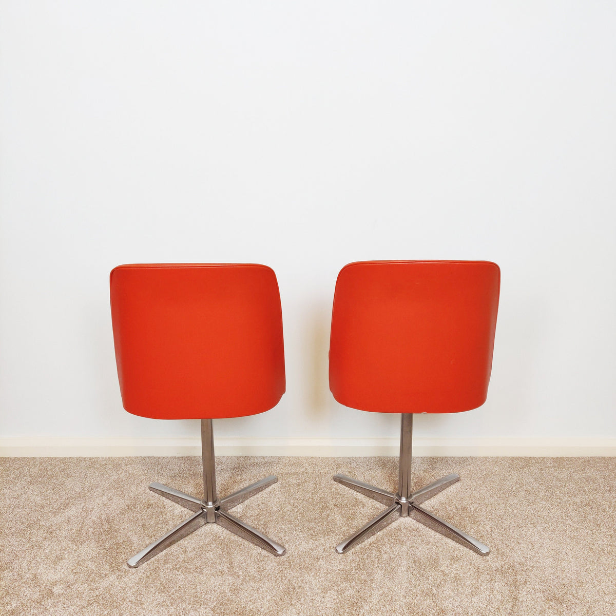 A Pair of Vintage Orange Leatherette Swivel Dining Chair, 70s Industri